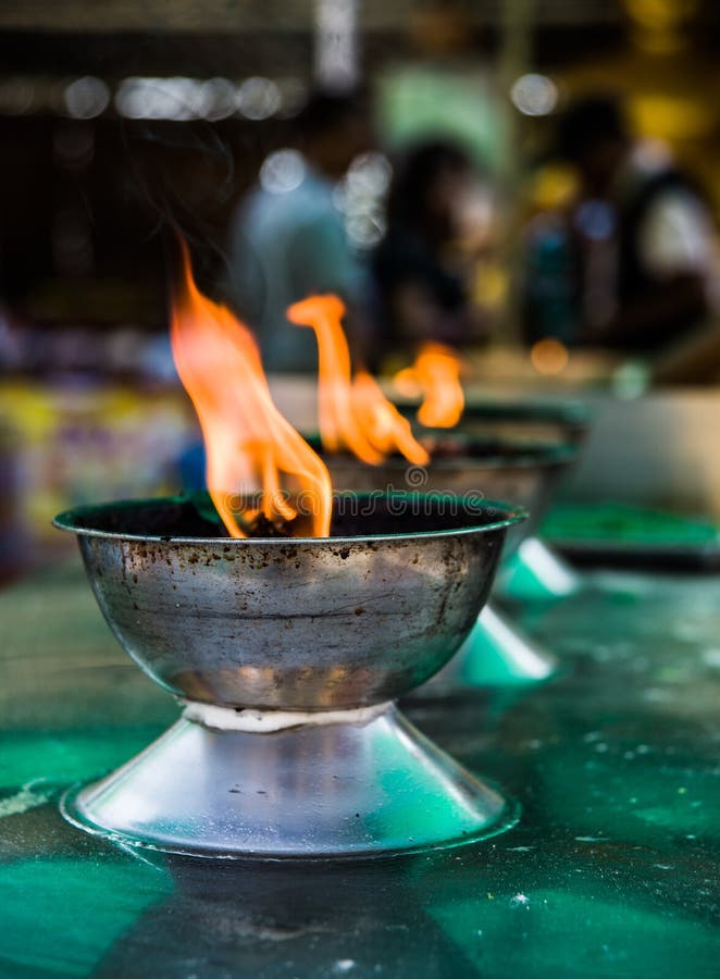 Lights in the Bowls. Religious Symbol of Buddhism. Stock Image - Image ...