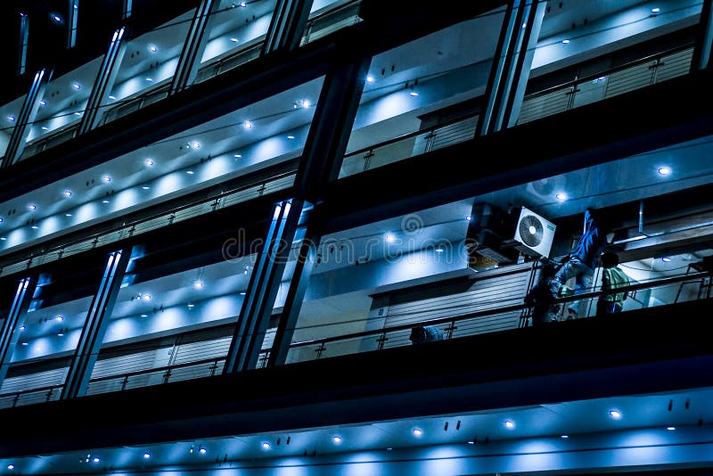 Lights in the Dark.a Building Shining with Blue or Yellow Colored ...