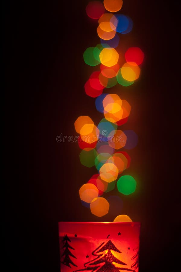 Lights emering from candle stock photo. Image of movement - 27627890