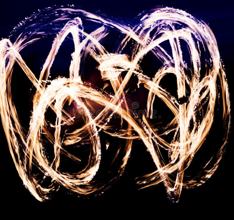 Lights from a Fire Show in the Dark Sky Stock Photo - Image of color ...