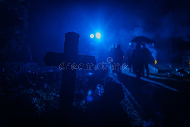 The Lights Illuminate the Black Cross of the Grave. Stock Image - Image ...