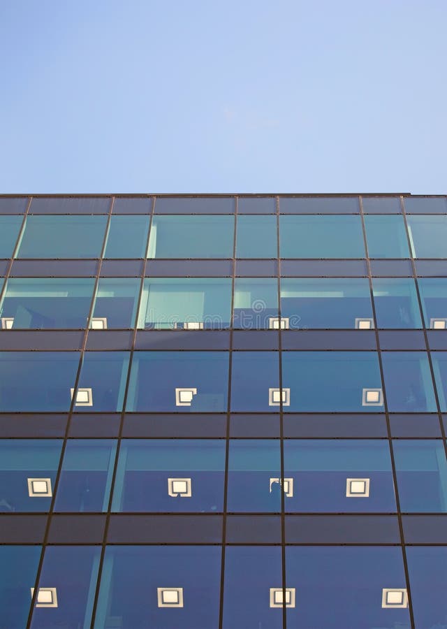 Illuminated Windows on the Facade of a Large Modern Office Building ...
