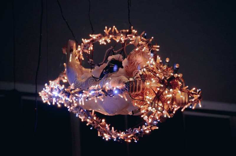 Lights Over a Statue Flying Stock Image - Image of ceiling, statue ...