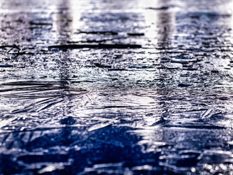 Lights Reflecting on the Ice in a Pond Stock Photo - Image of ...