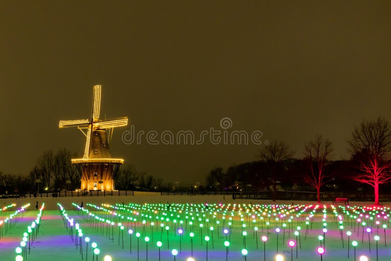 Lights in Rows Along with Windmill in the Background at Night Stock ...