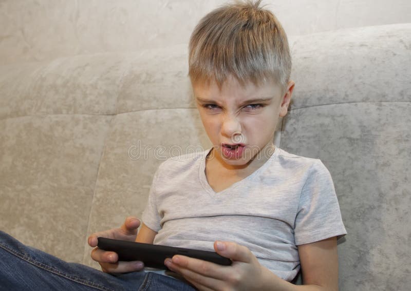Liitle Boy is Angry that His Parents Take the Phone. Game Dependency ...