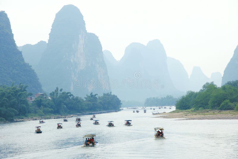 Lijiang scenery stock image. Image of scenic, boat, mountain - 34174441