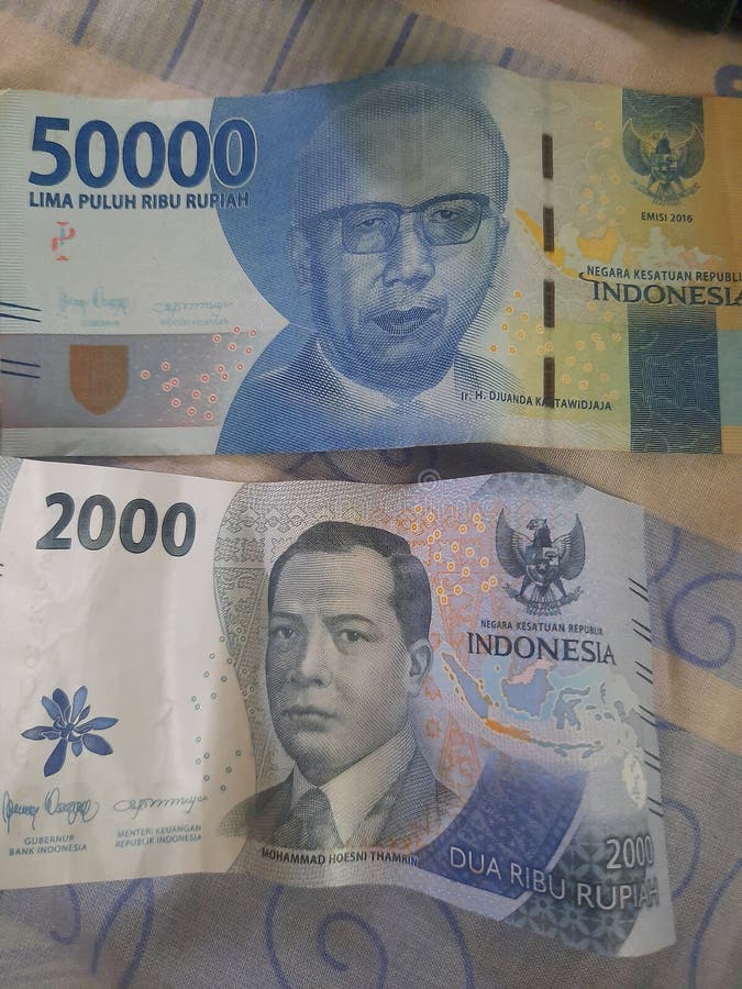 A 2000 Rupiah Indonesian Bank Note with a Gold South African Krugerrand ...