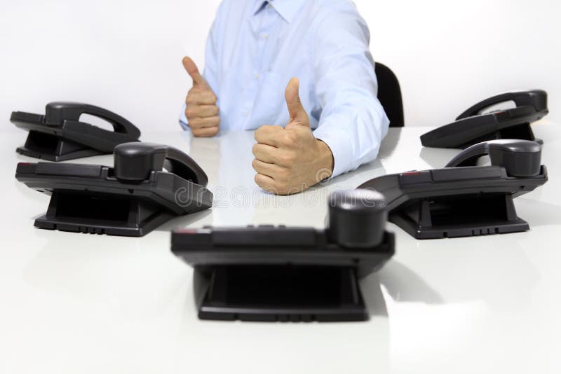 Like Hand with Office Phones on Desk Stock Image - Image of like, hands ...
