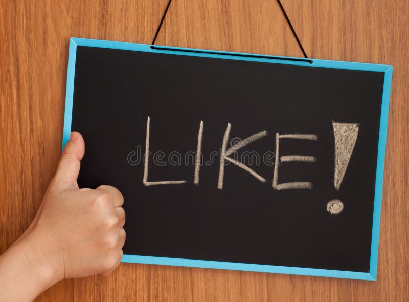 Like Word with Multicolored Heart Stones Over Beach Sand Stock Image ...