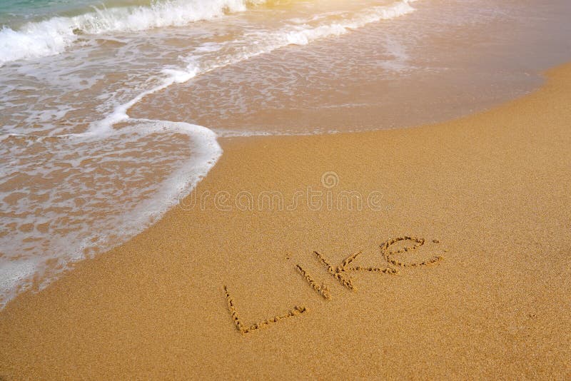 Like Word on a Sand of Beach Sand Background with Natural Wave Foam ...
