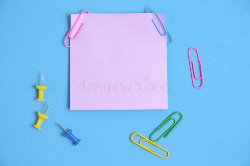 Lilac Paper Stickers for Writing Notes on a Blue Background. Stock ...