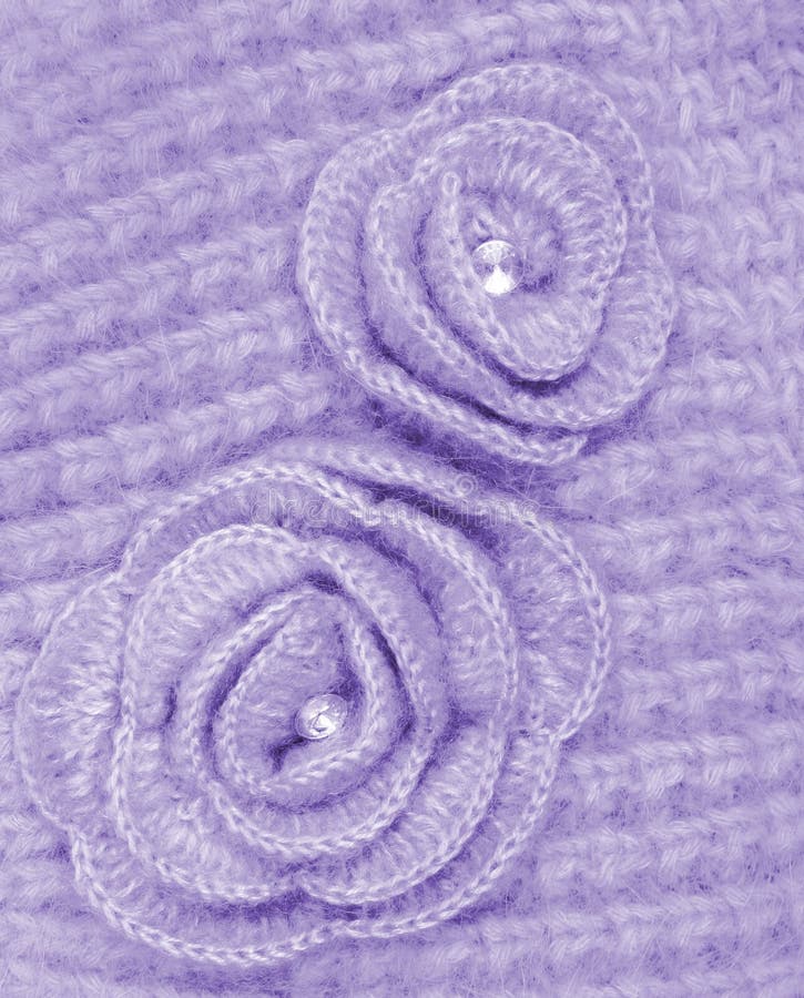 Lilac Wool Flowers on Lilac Wool Knitted As Background Stock Photo ...
