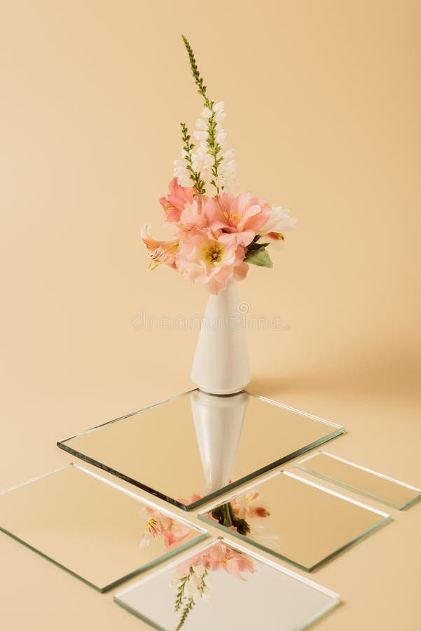 Lily Flowers in Vase Reflecting in Mirrors on Beige Stock Image - Image ...