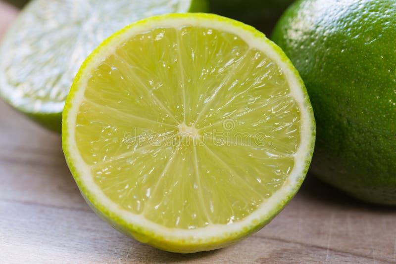 Lime Cut As Detail on Wooden Board Stock Photo - Image of ingredient ...
