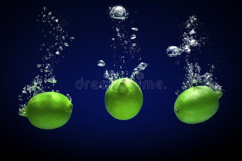 Lime dropped into water stock photo. Image of lemon, fresh - 12080792