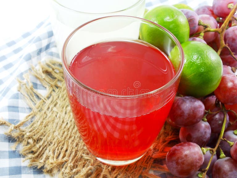 Lime and grapes juice stock image. Image of lemon, fresh - 71560387