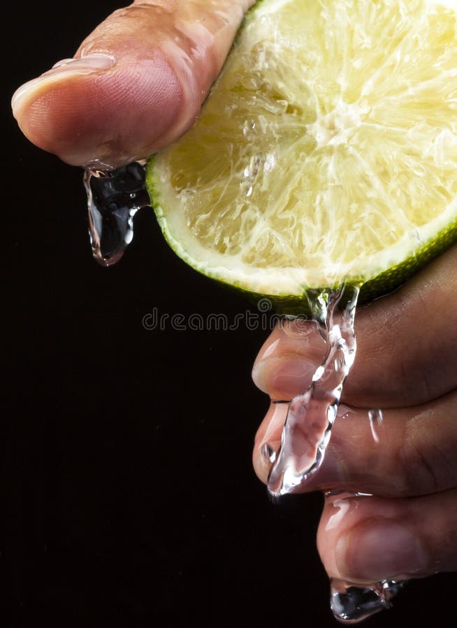 Lime in hand stock photo. Image of refreshing, ripe, white - 25929128