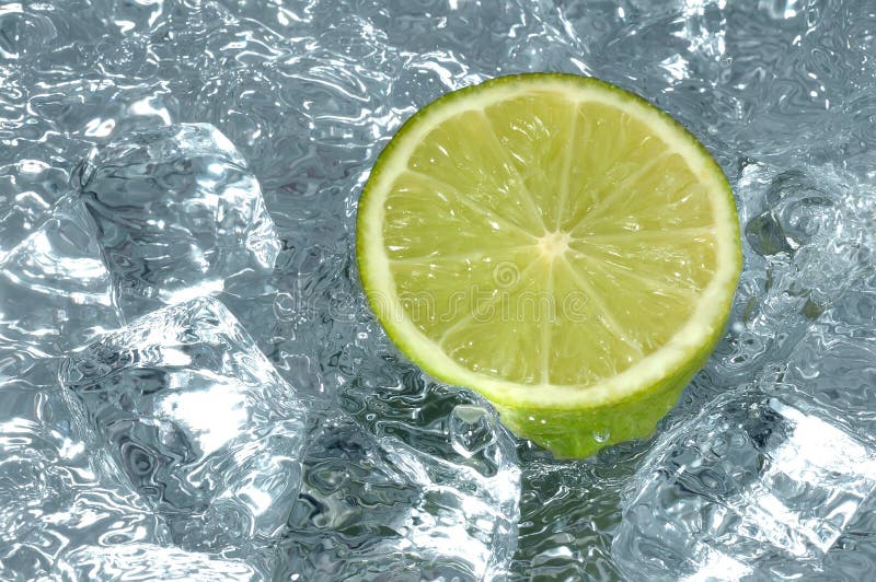 Lime with ice cubes stock image. Image of juicy, rain - 210889517