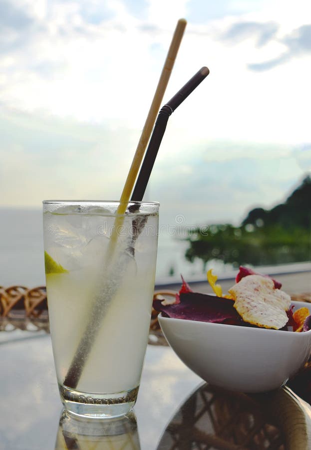 Lime Juice Drink and Root Vegetable Chips Stock Image - Image of snack ...