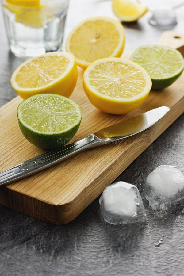 Lime and Lemon with Ice Cubes Stock Photo - Image of frozen, cocktail ...