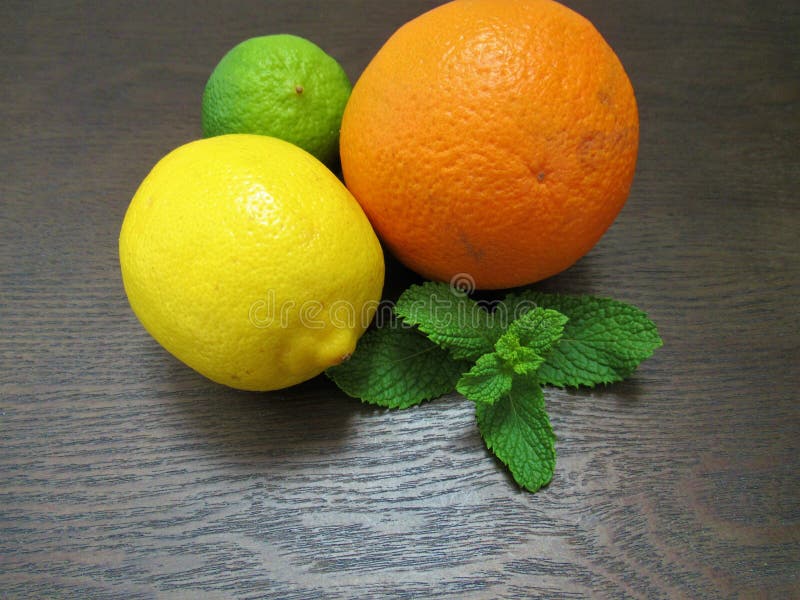 Lime, Lemon, Orange stock photo. Image of wood, healthy - 150755762