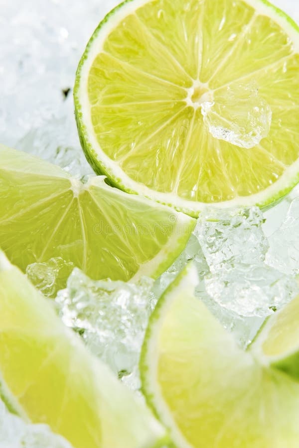 Lime pieces mixed with ice stock image. Image of juicy - 26310315