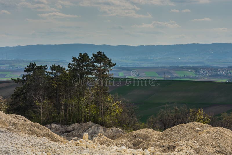 Lime Quarry with Trees in a Landscape Stock Photo - Image of horizon ...