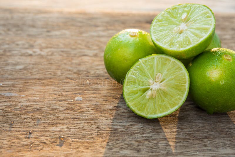 Lime slice on wood stock photo. Image of food, natural - 58208196