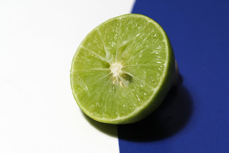 Lime Split in Half on Wooden Table Stock Image - Image of summer ...