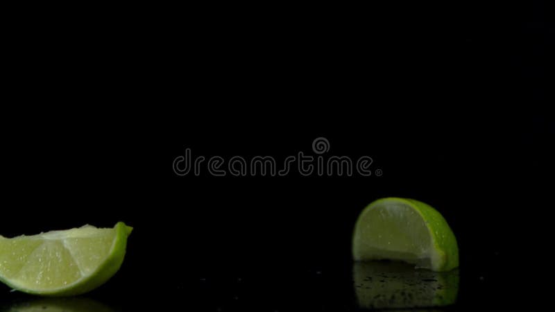 Lime Splits into Segments on a Black Background Stock Footage - Video ...
