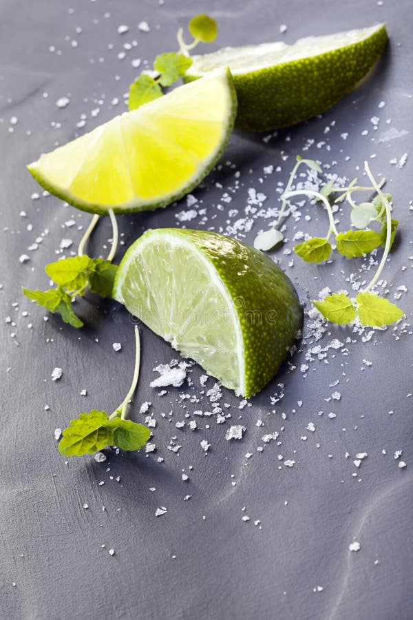 Limes on Sea Salt stock image. Image of halved, food, macro - 2104333