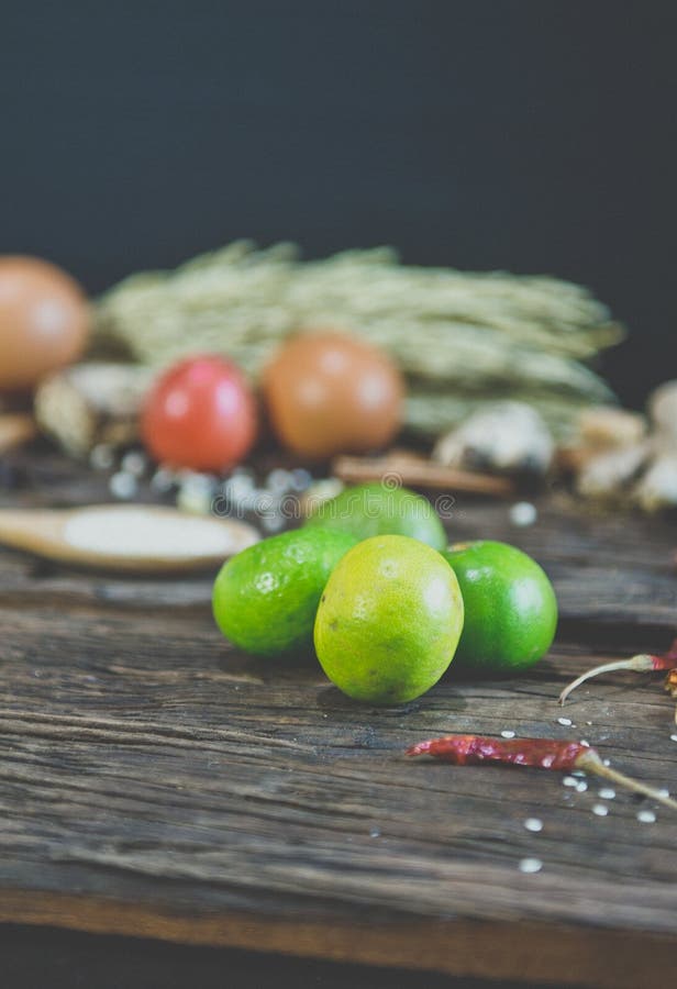 Lime on wooden table stock image. Image of vegetable - 94252491