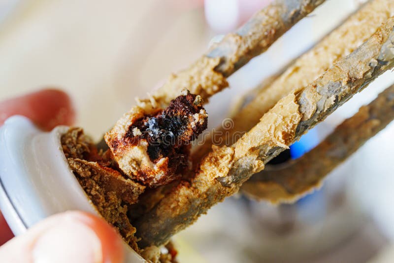 Limescale on the Heating Element of the Water Heater. Stock Photo ...