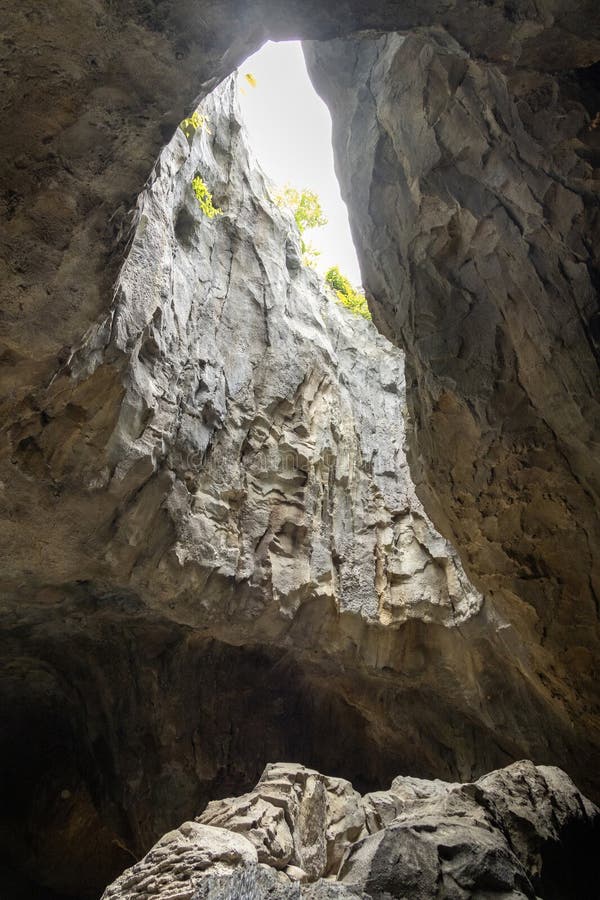 Limestone Cave with Sunlight Shine through the Opening Stock Image ...
