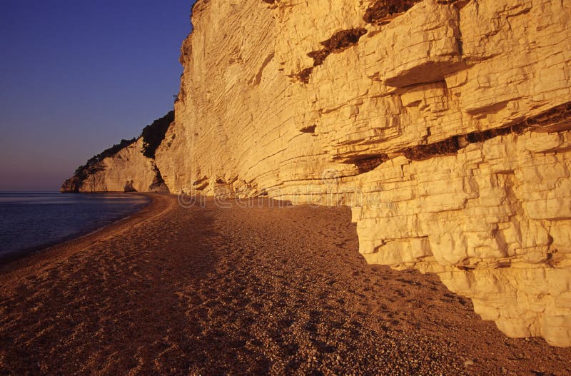 Limestone cliff stock image. Image of beach, italy, mediterranean - 2867697