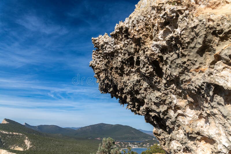 Limestone Cliff with Eroded Surface Over Valley at Capo Caccia Stock ...