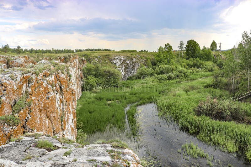 Limestone Cliffs Above a Calm Overgrown River Stock Image - Image of ...