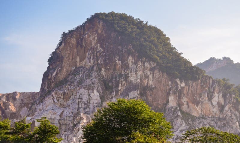 Limestone hill stock photo. Image of mining, earth, water - 207963812