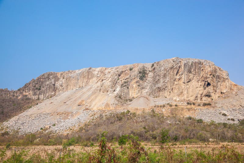 Limestone quarry stock photo. Image of excavation, stone - 182255662