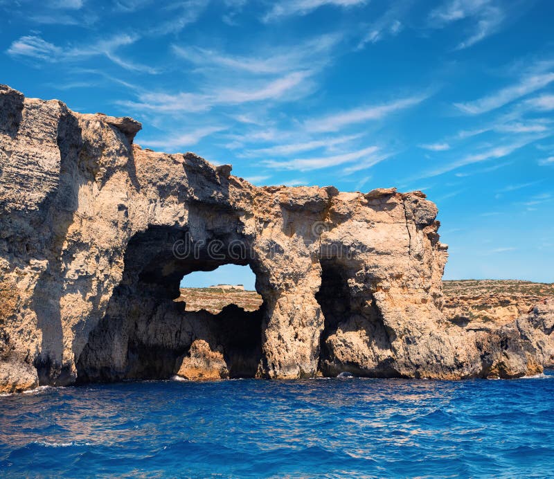 Limestone Rock Caves and Blue Mediterranean Water of Comino Stock Image ...