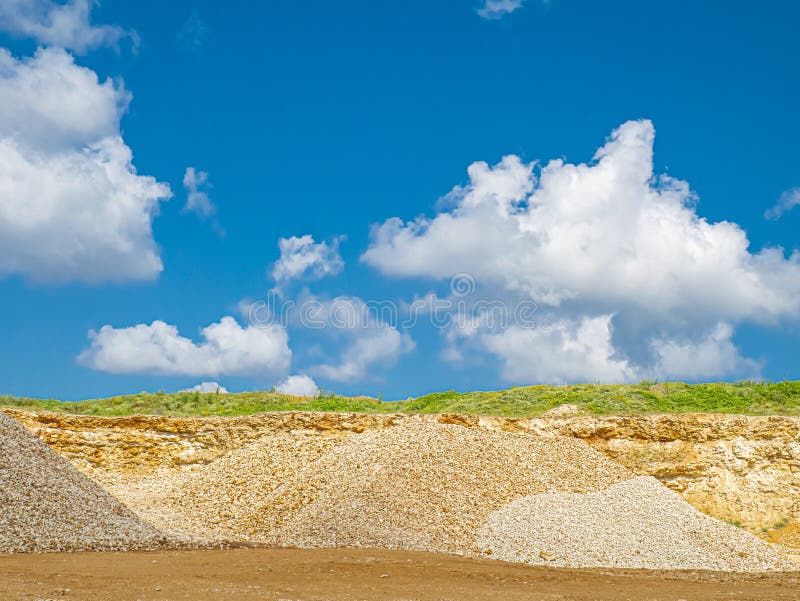 Limestone Stone Quary and an Excavator. Stock Image - Image of ...