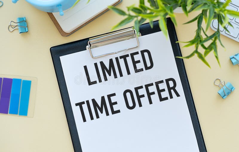 Limited Time Offer Text on the Clipboard Page on Yellow Folder Near on ...