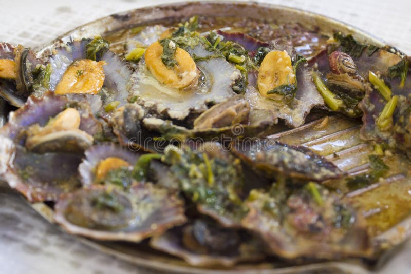 Limpets Fried in a Grill. Portuguese Seafood Stock Image - Image of ...
