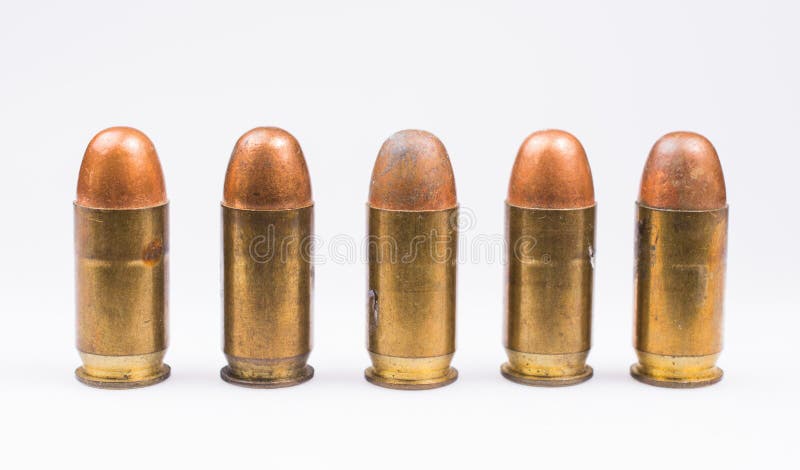 Line of 38 caliber bullets stock photo. Image of firearm - 54370788