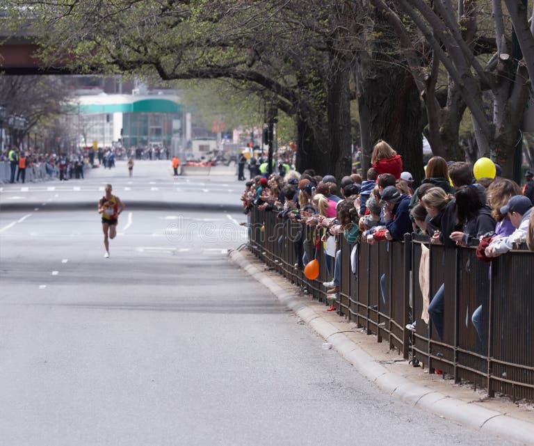 Line of Cheering Fans editorial stock photo. Image of runner - 742578
