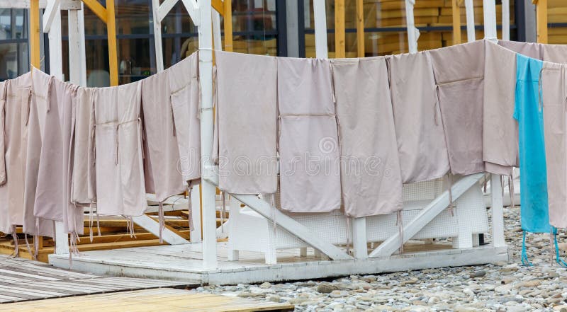 A Line of Clothes Hanging on a Clothesline Stock Photo - Image of ...
