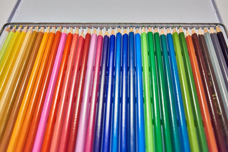 Line of colored pencils stock image. Image of equipment - 64456311