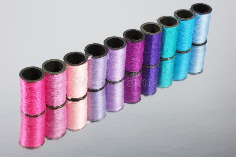 Line of colorful threads stock photo. Image of spool - 14877596