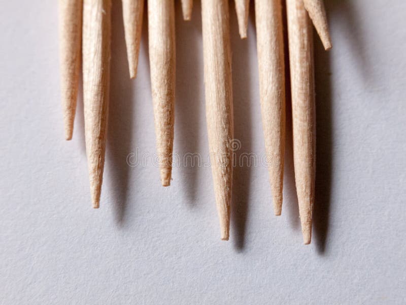 A Line of the Ends of Cocktail Sticks on White Background Stock Image ...